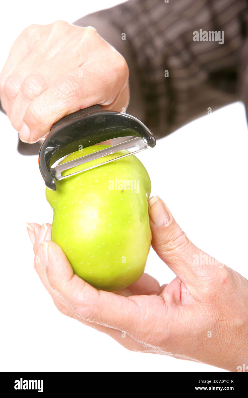 Woman Peeling an Apple Model Released Stock Photo - Alamy