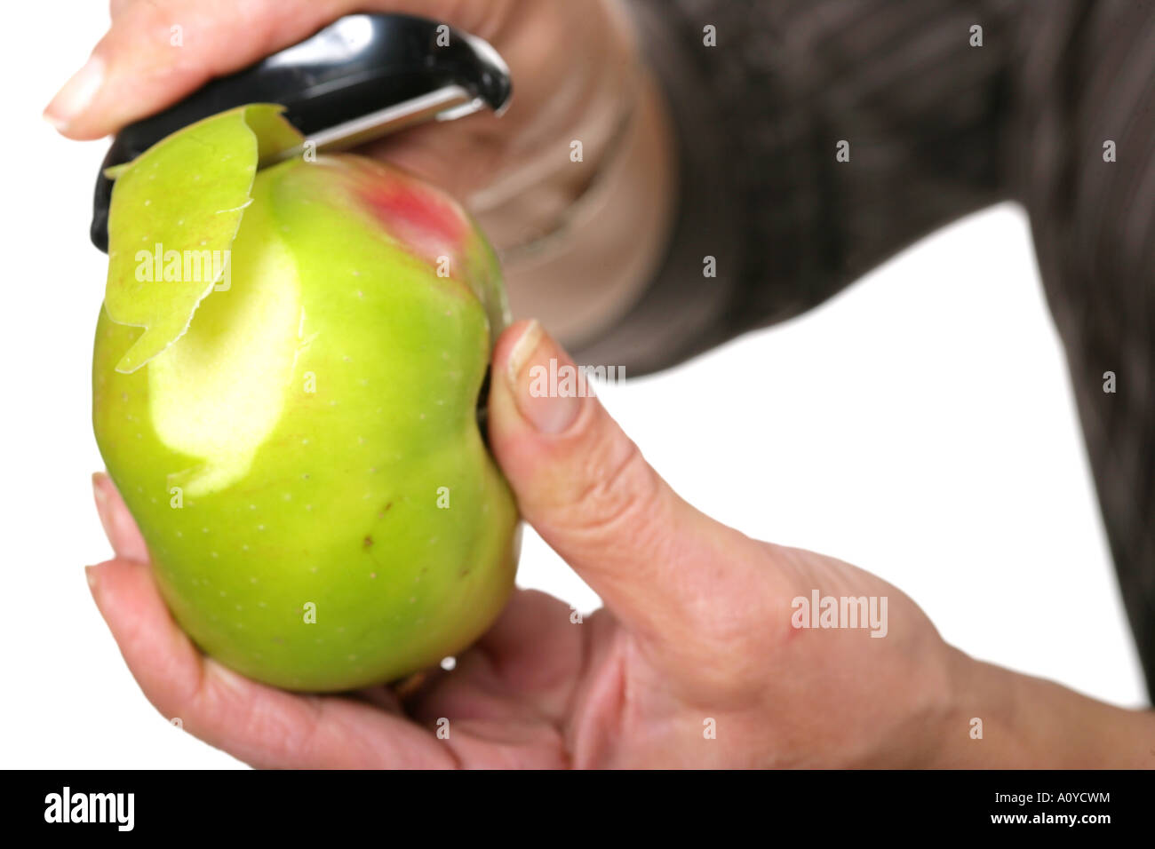 Woman Peeling an Apple Model Released Stock Photo - Alamy