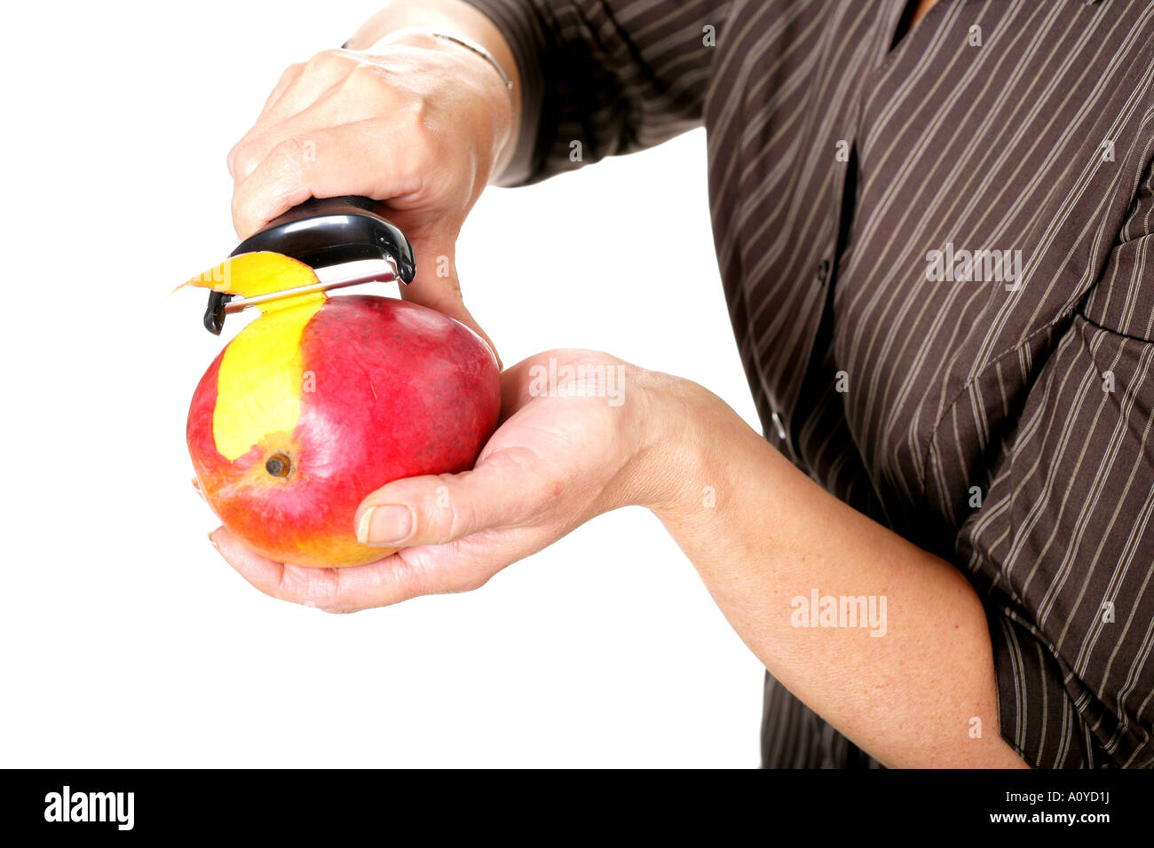 Woman mango peeling hi-res stock photography and images - Alamy