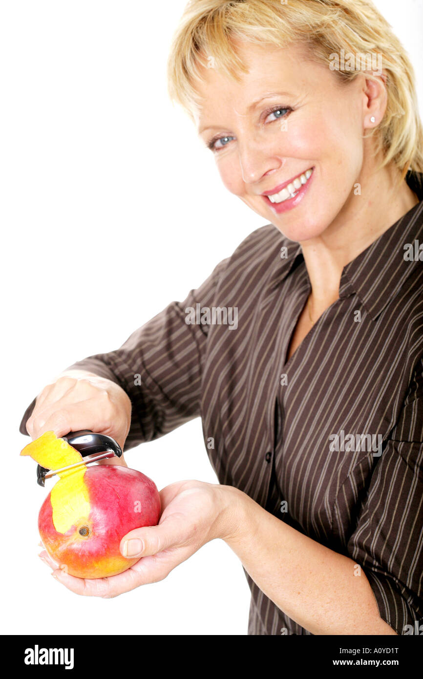 Woman mango peeling hi-res stock photography and images - Alamy