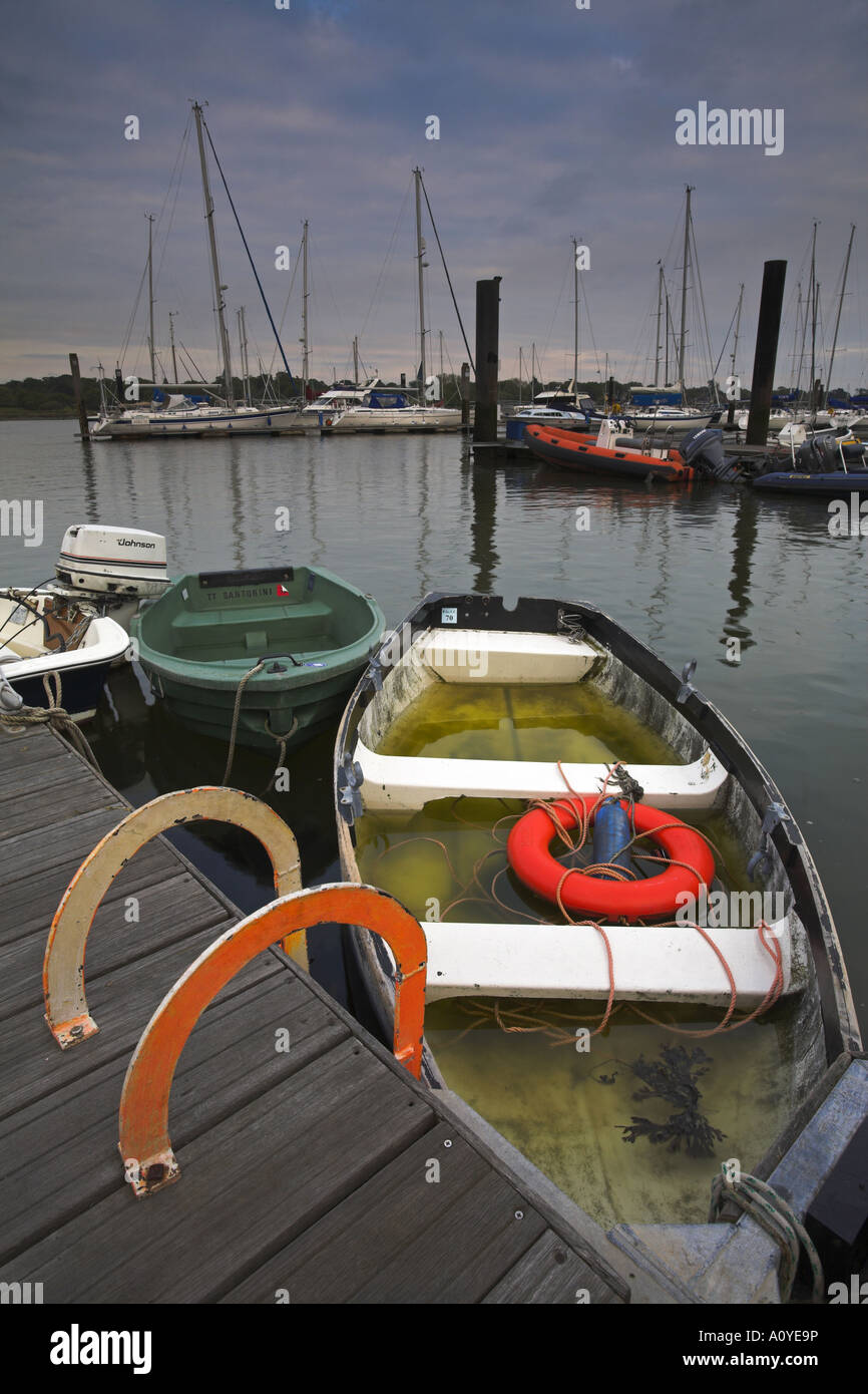 A small boat half filled with water Hamble Stock Photo - Alamy