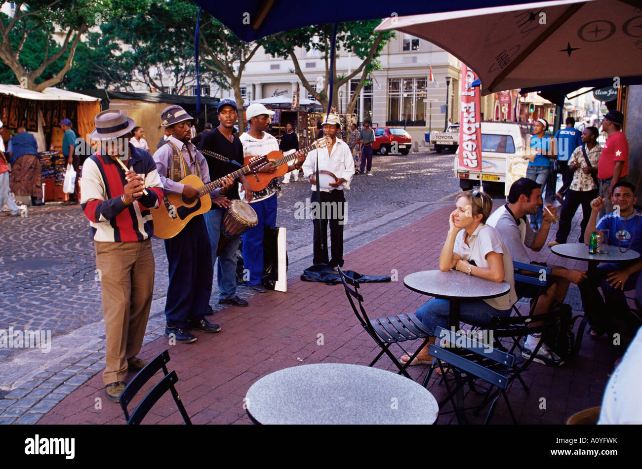 Musicians playing outside a cafe in the city centre Cape Town South ...