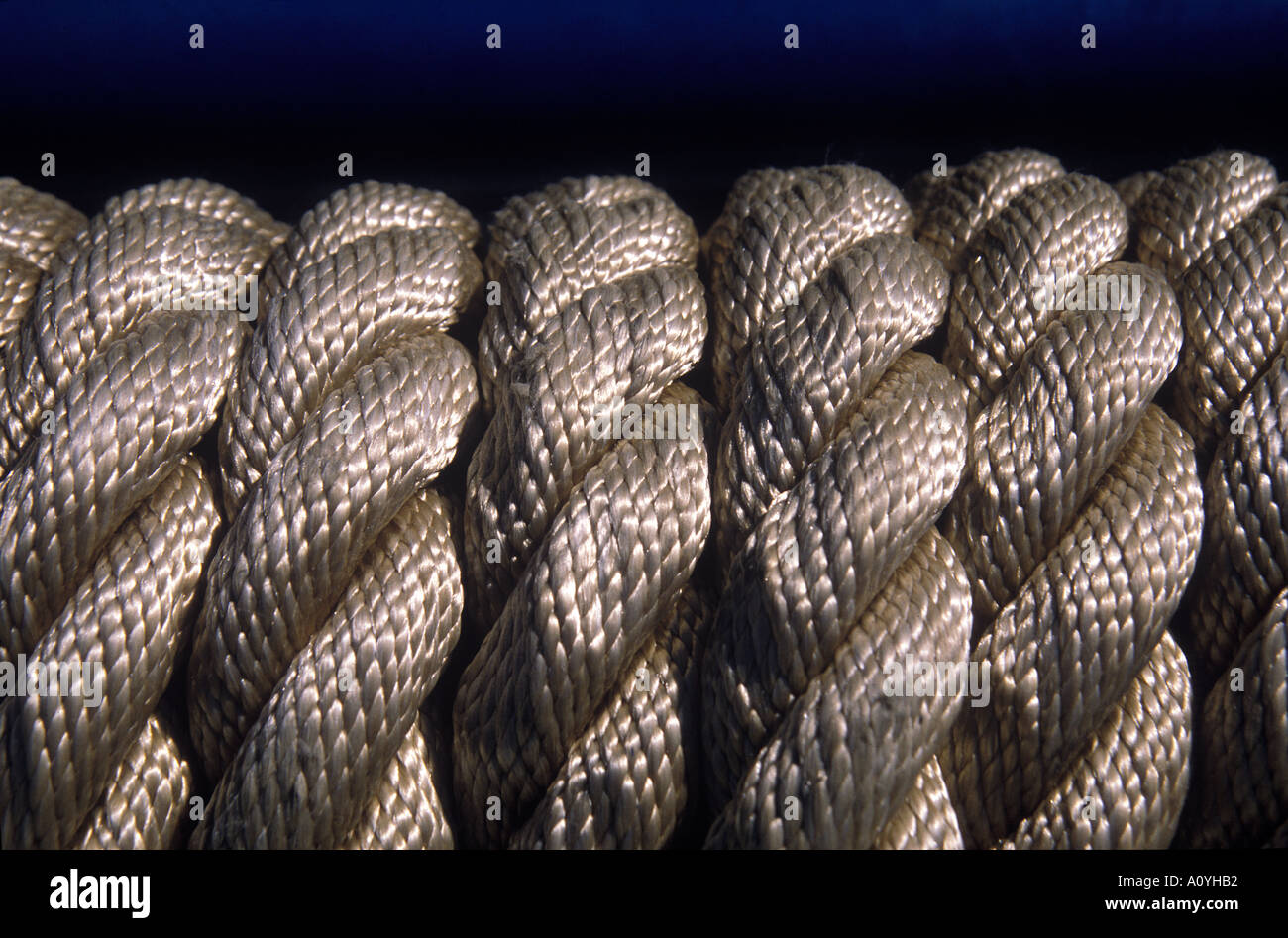 Mooring line coiled Stock Photo - Alamy