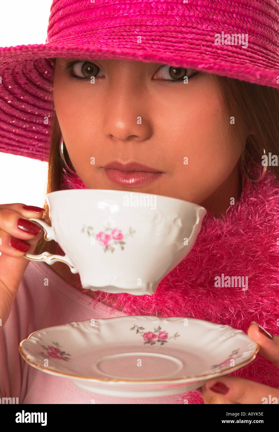Pretty Asian Teen Girl Sipping Tea USA Stock Photo - Alamy