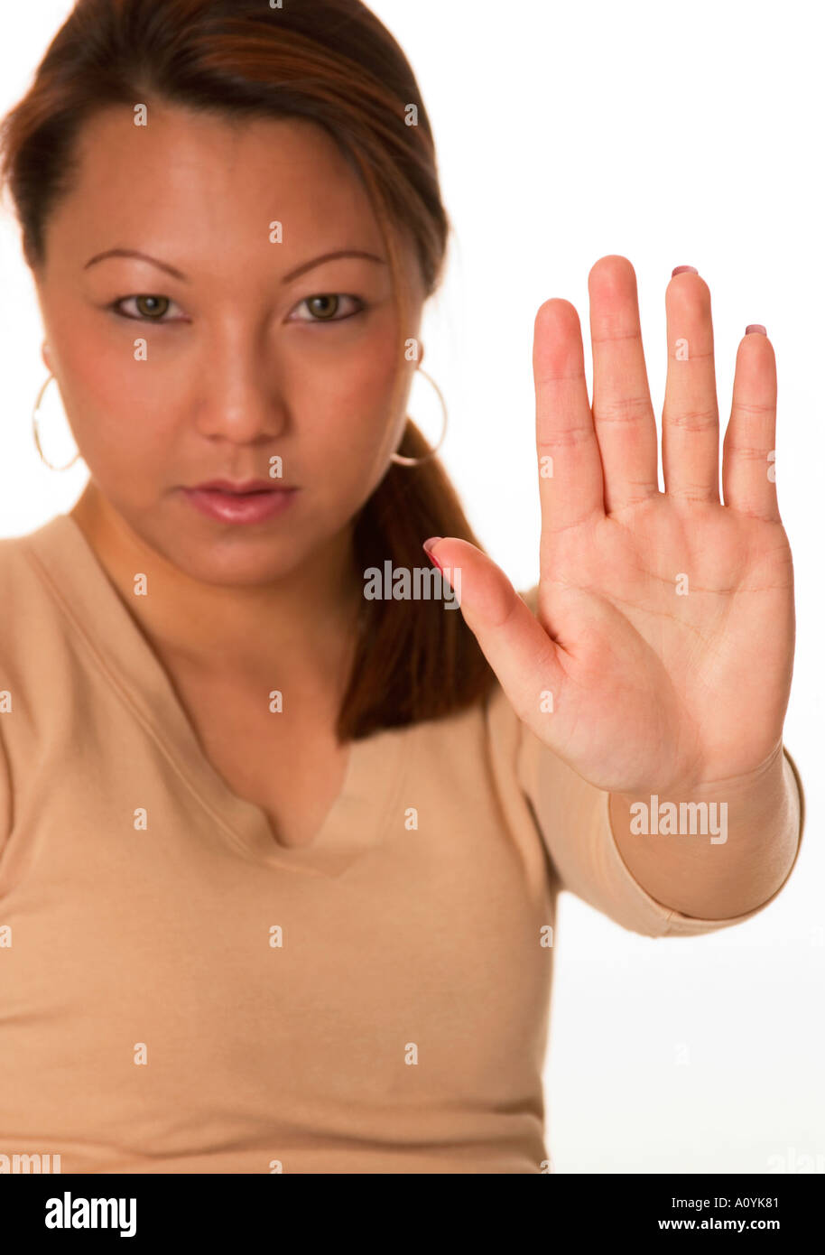 Asian Teen Girl Gives Hand Signal for Stop USA Stock Photo - Alamy