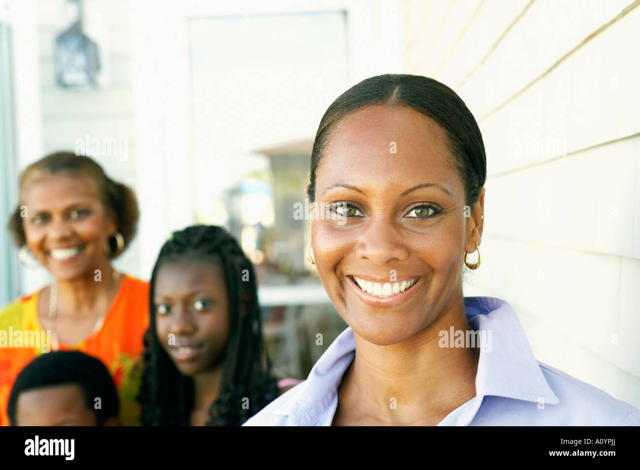 Young African woman smiling Stock Photo - Alamy