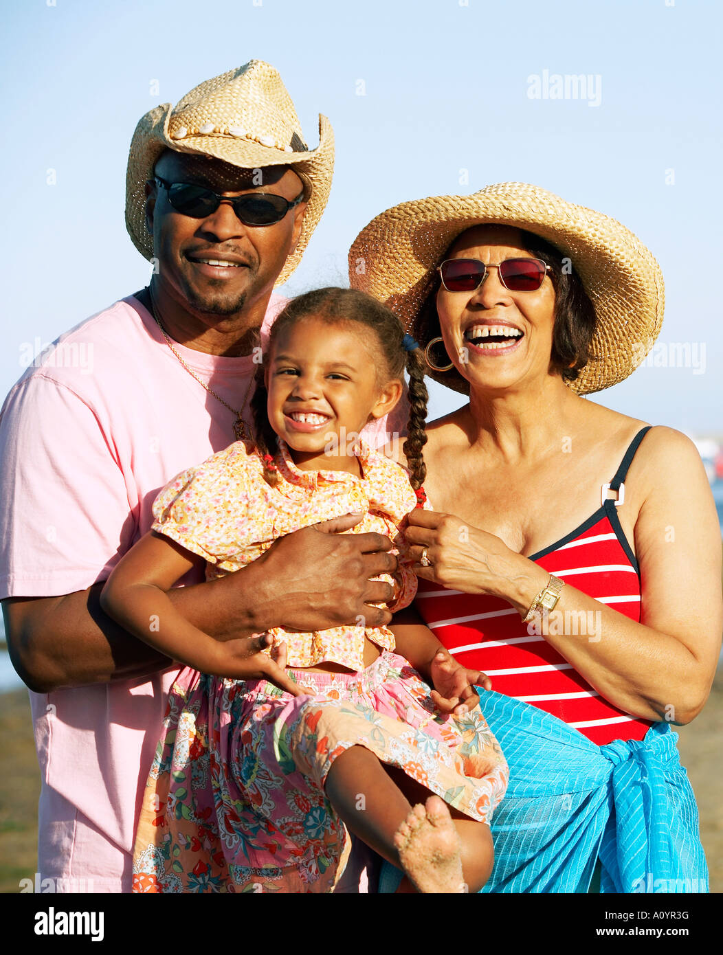 African family smiling on the beach Stock Photo - Alamy