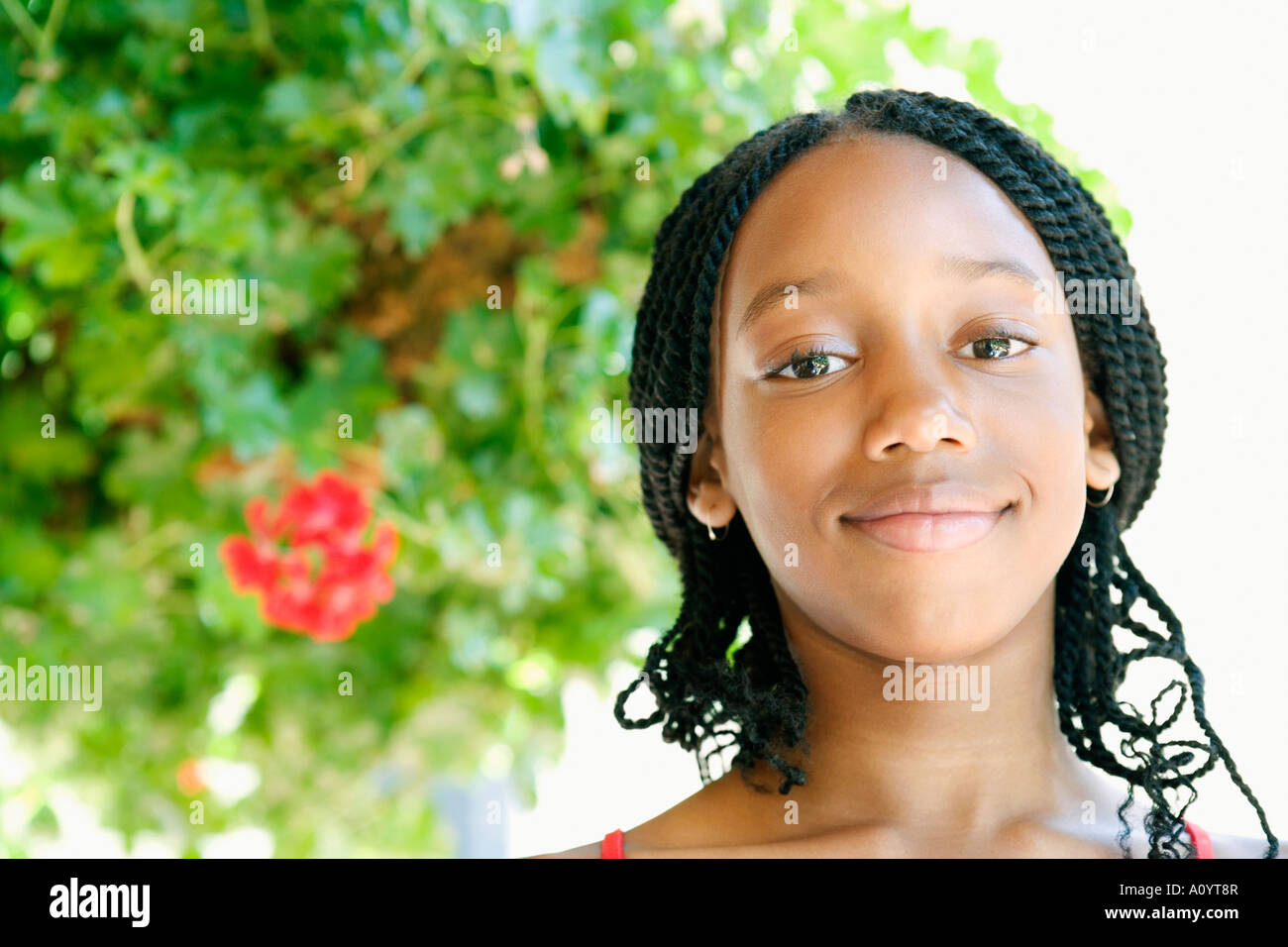 Young African woman smiling Stock Photo - Alamy