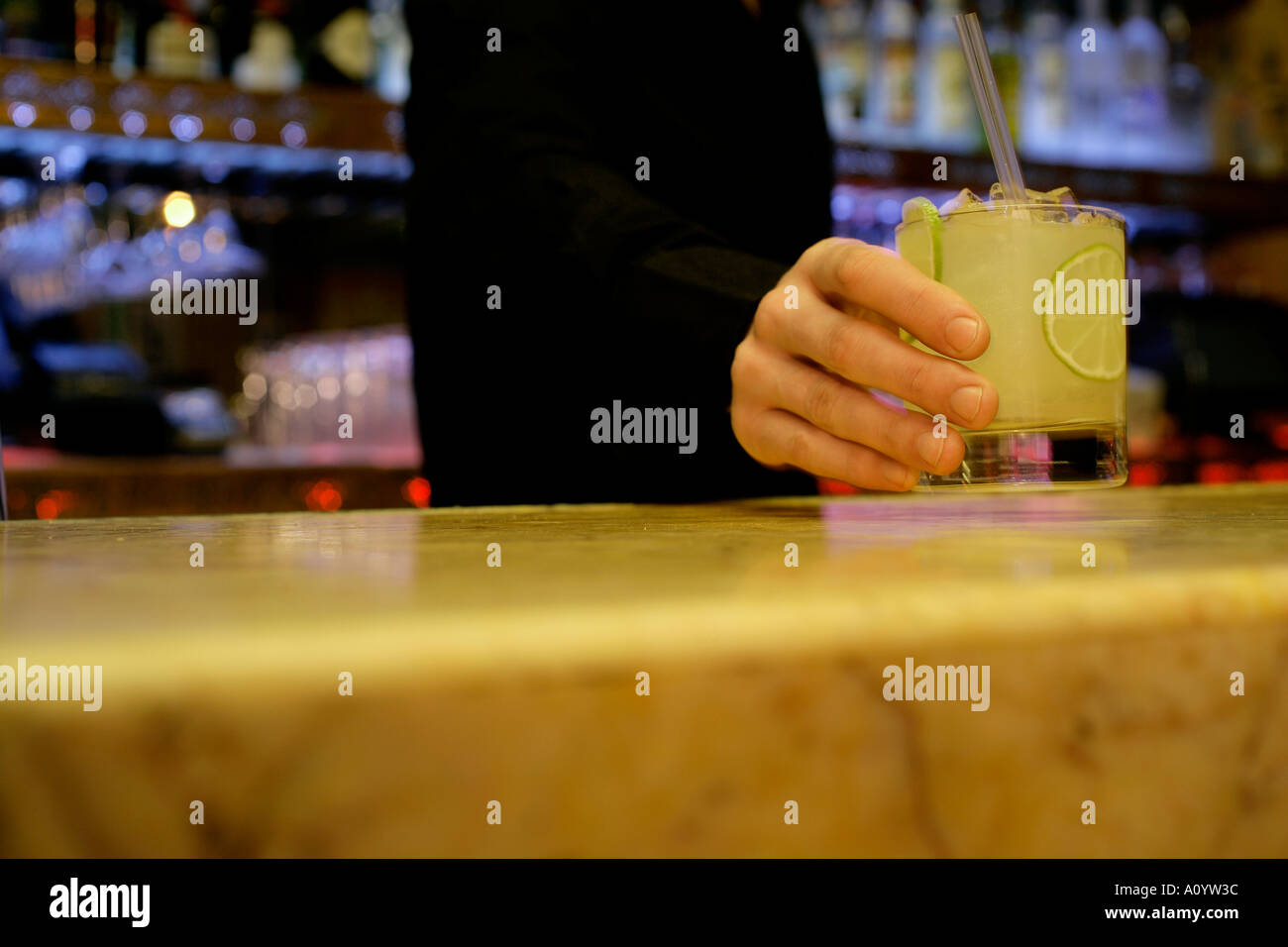 Bar staff serving cocktails hi-res stock photography and images - Alamy