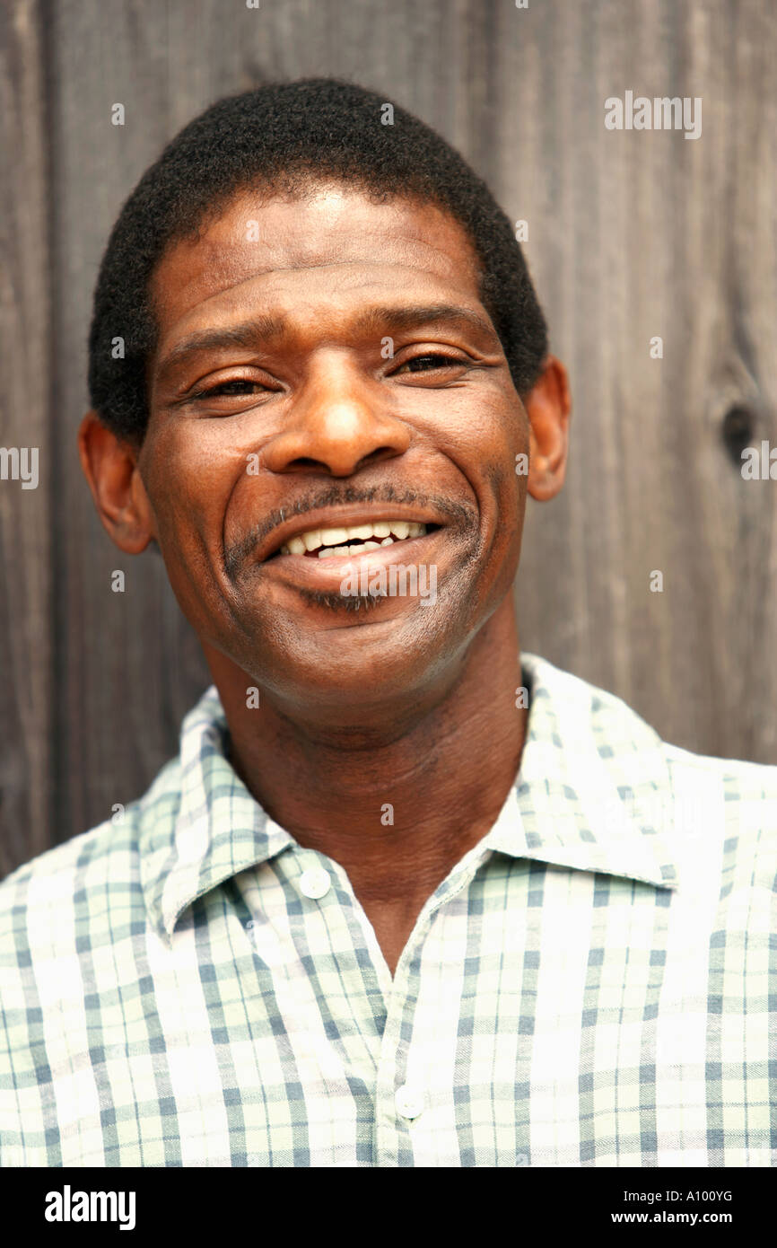 Middle-aged African man smiling Stock Photo - Alamy