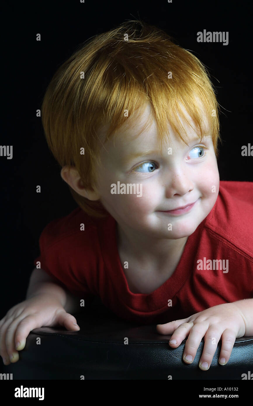 red headed boy smiling Stock Photo - Alamy