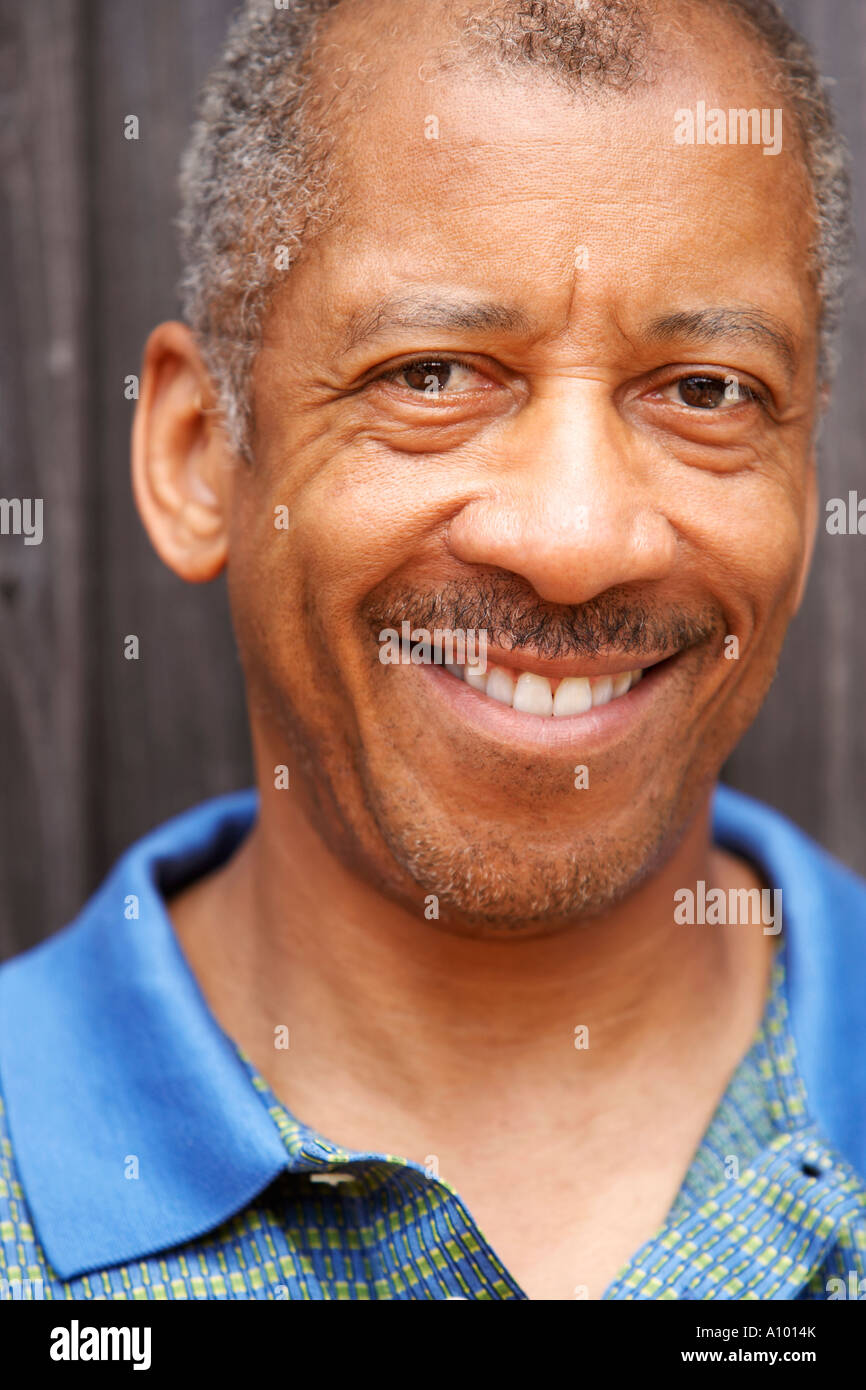 Middle-aged African man smiling Stock Photo - Alamy
