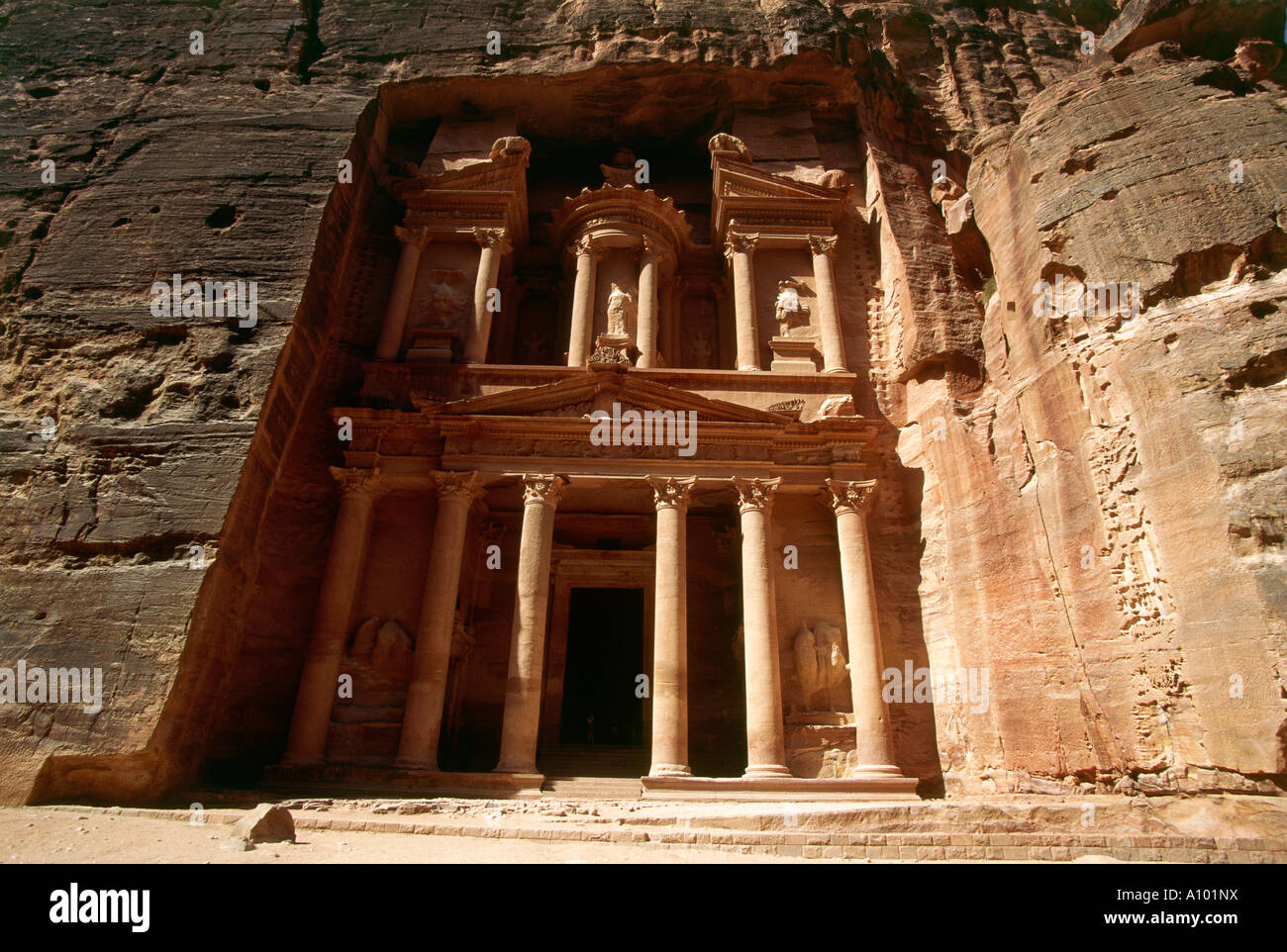Carved out of the rock is the building at Petra known as The Treasury ...