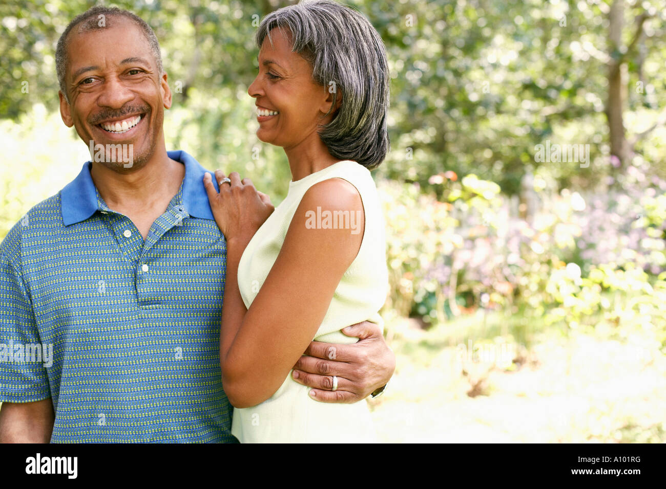 Middle-aged African couple smiling Stock Photo - Alamy