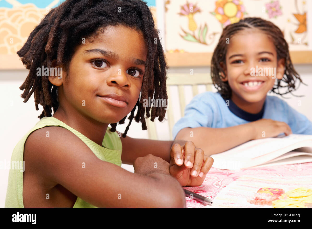 Young African children doing their homework Stock Photo - Alamy