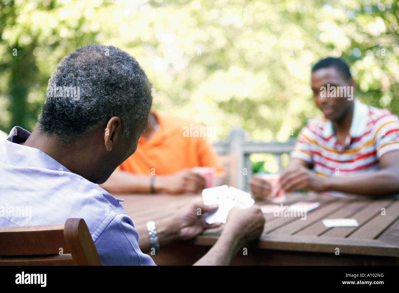 African men playing cards Stock Photo - Alamy
