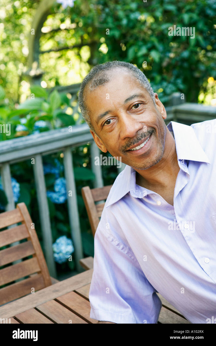 Middle-aged African man smiling Stock Photo - Alamy