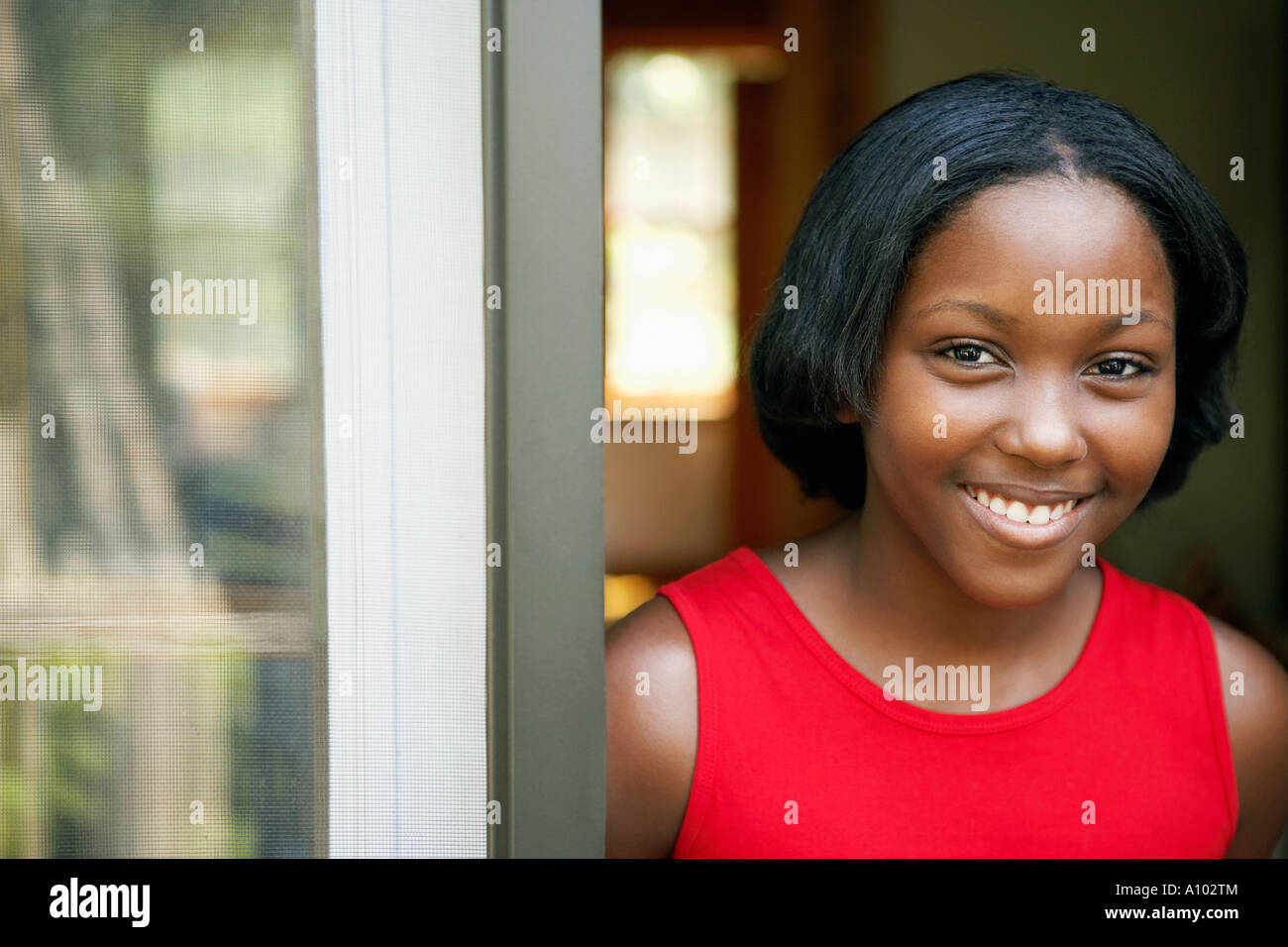 Young African girl smiling Stock Photo - Alamy