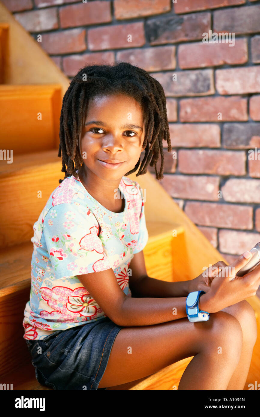 Young African girl smiling Stock Photo - Alamy