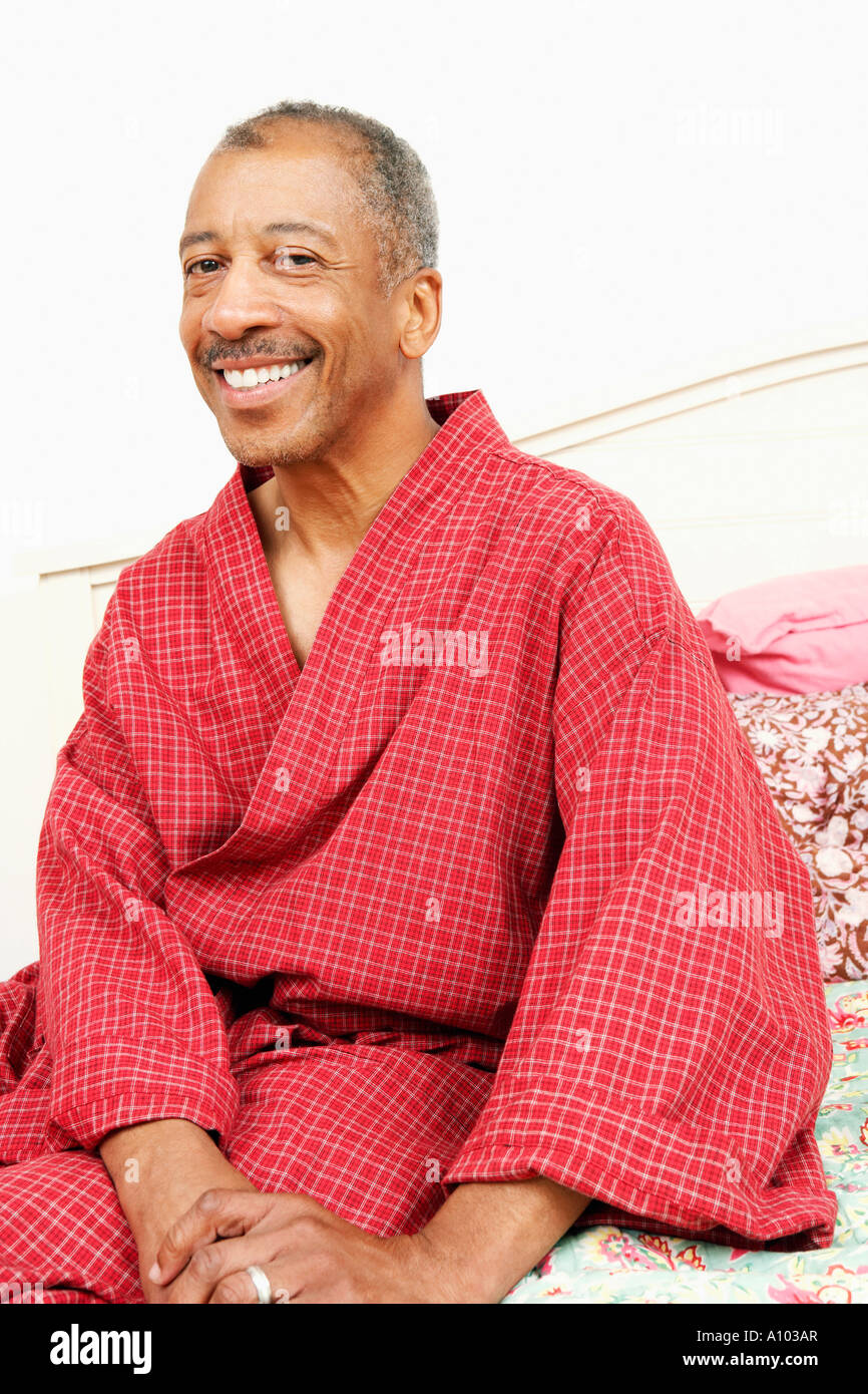 Middle-aged African man wearing a bathrobe Stock Photo - Alamy