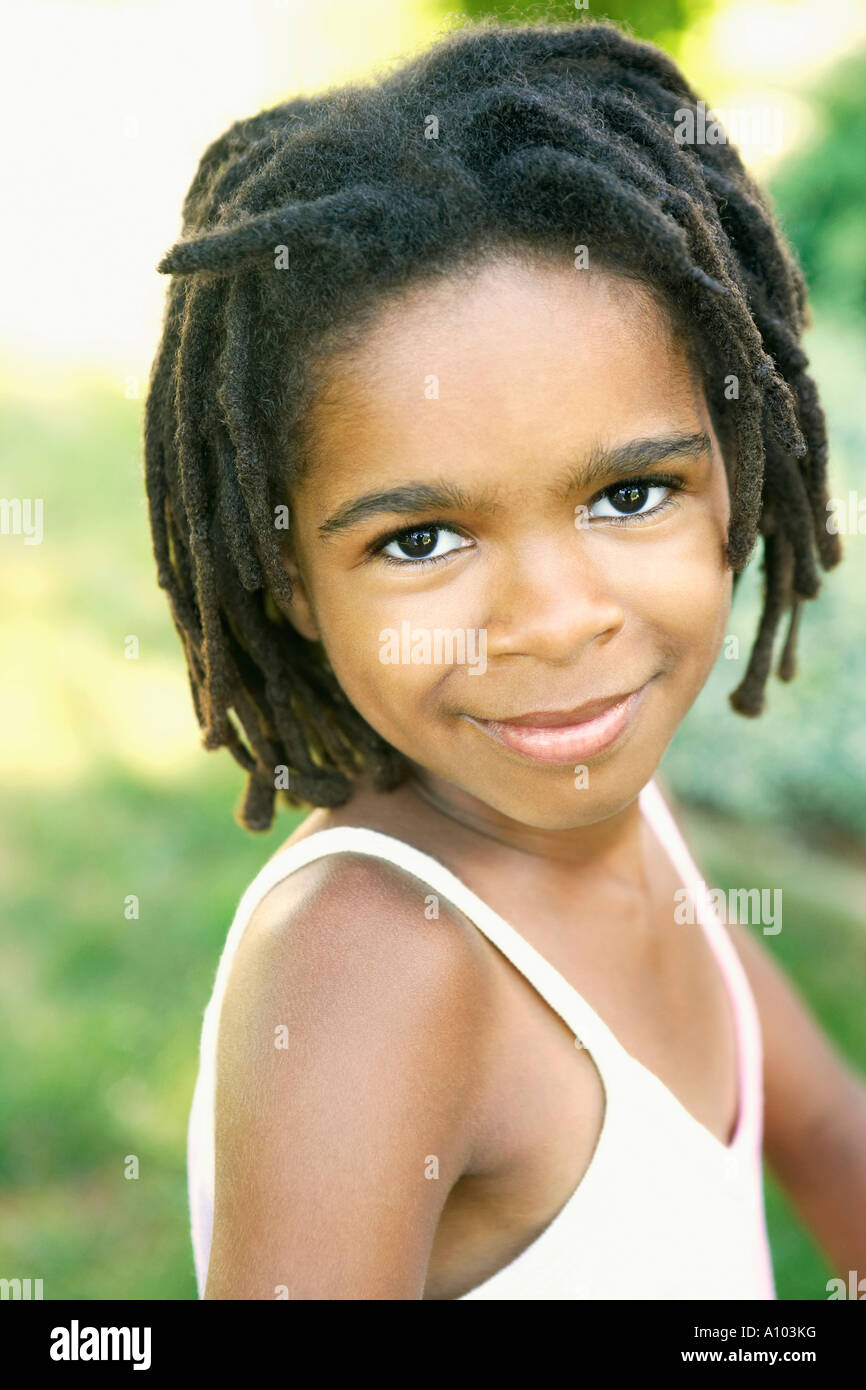 Young African girl smiling Stock Photo - Alamy