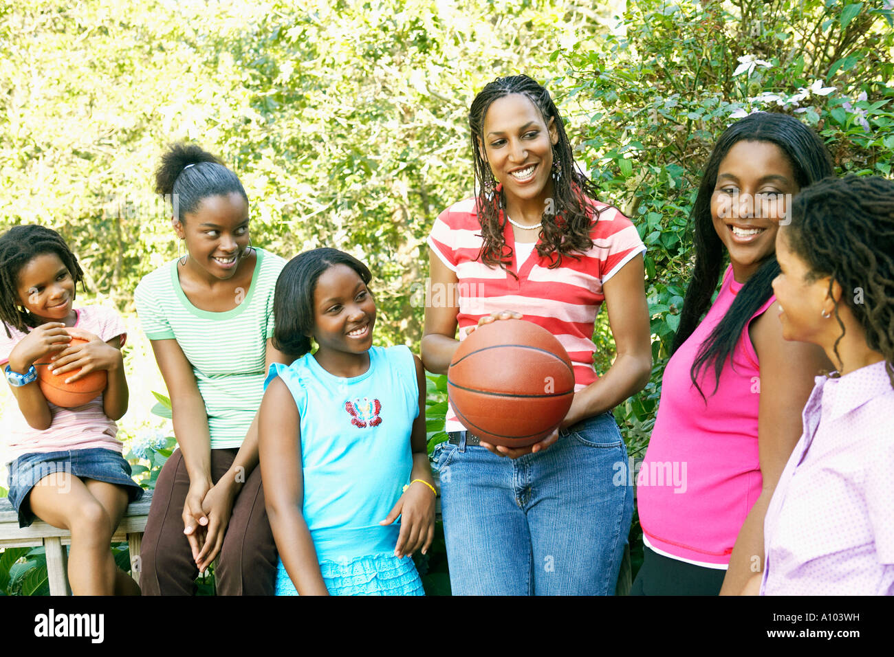 Female members of African family together outdoors Stock Photo - Alamy