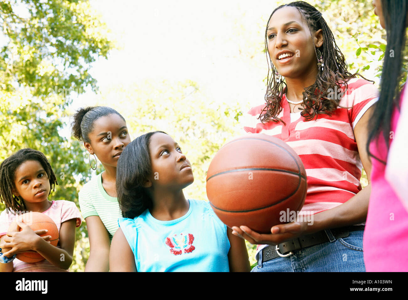 Female members of African family together outdoors Stock Photo - Alamy