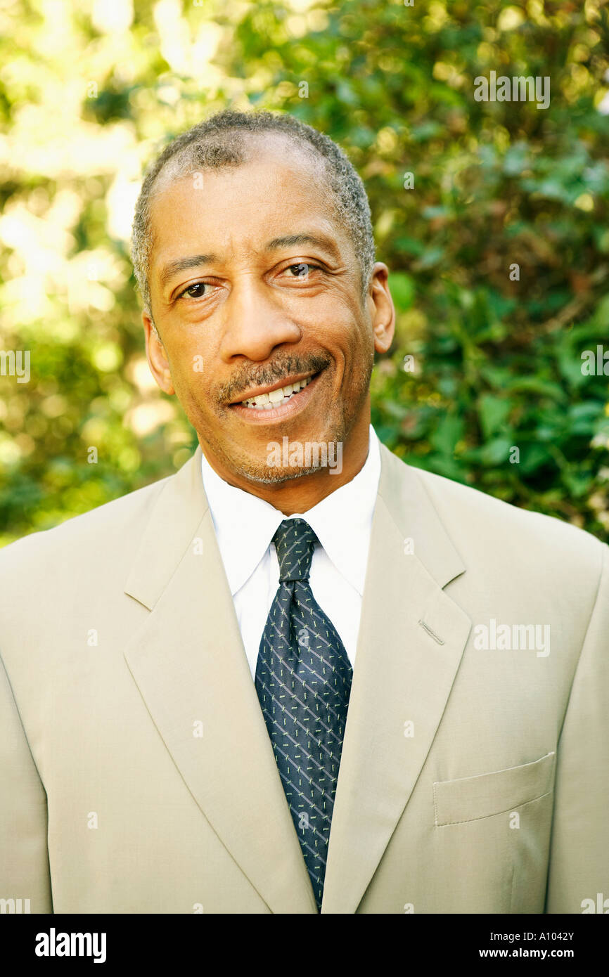 Middle-aged African man wearing a suit Stock Photo - Alamy