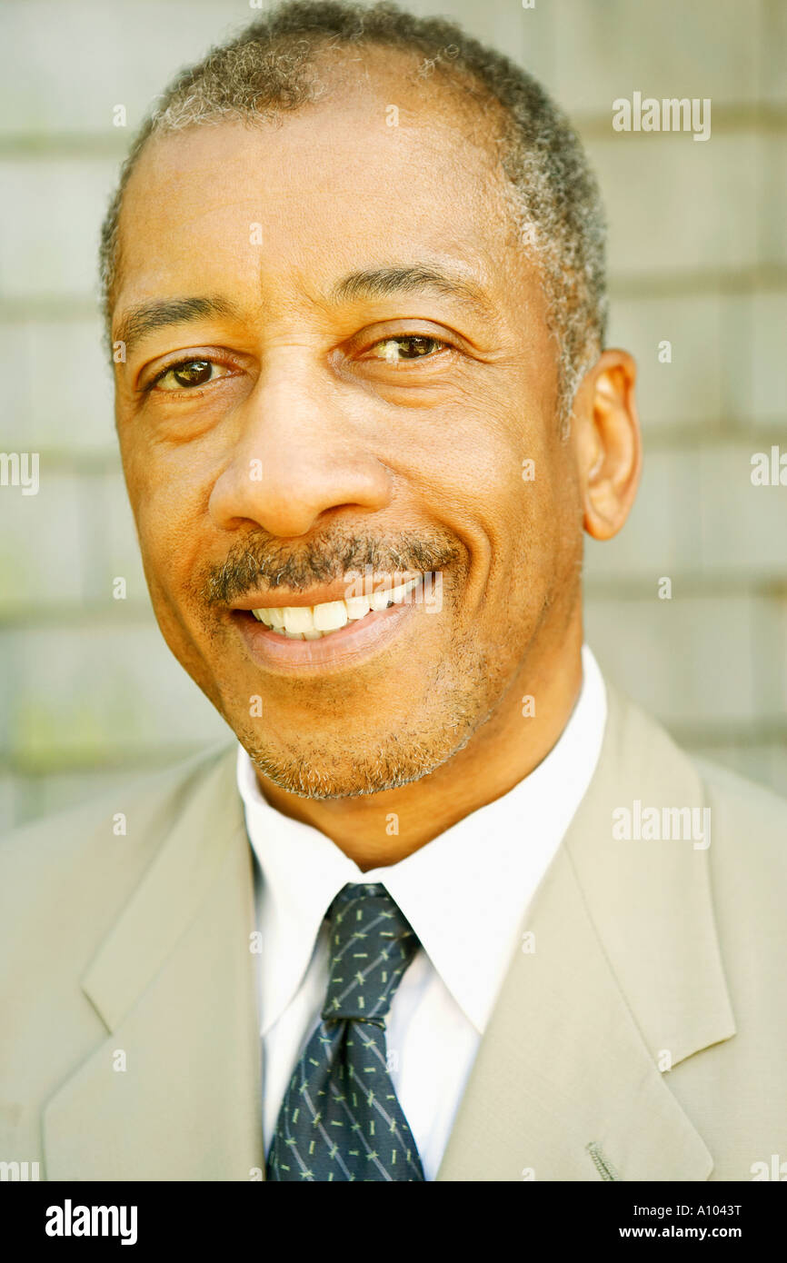 Middle-aged African man wearing a suit Stock Photo - Alamy