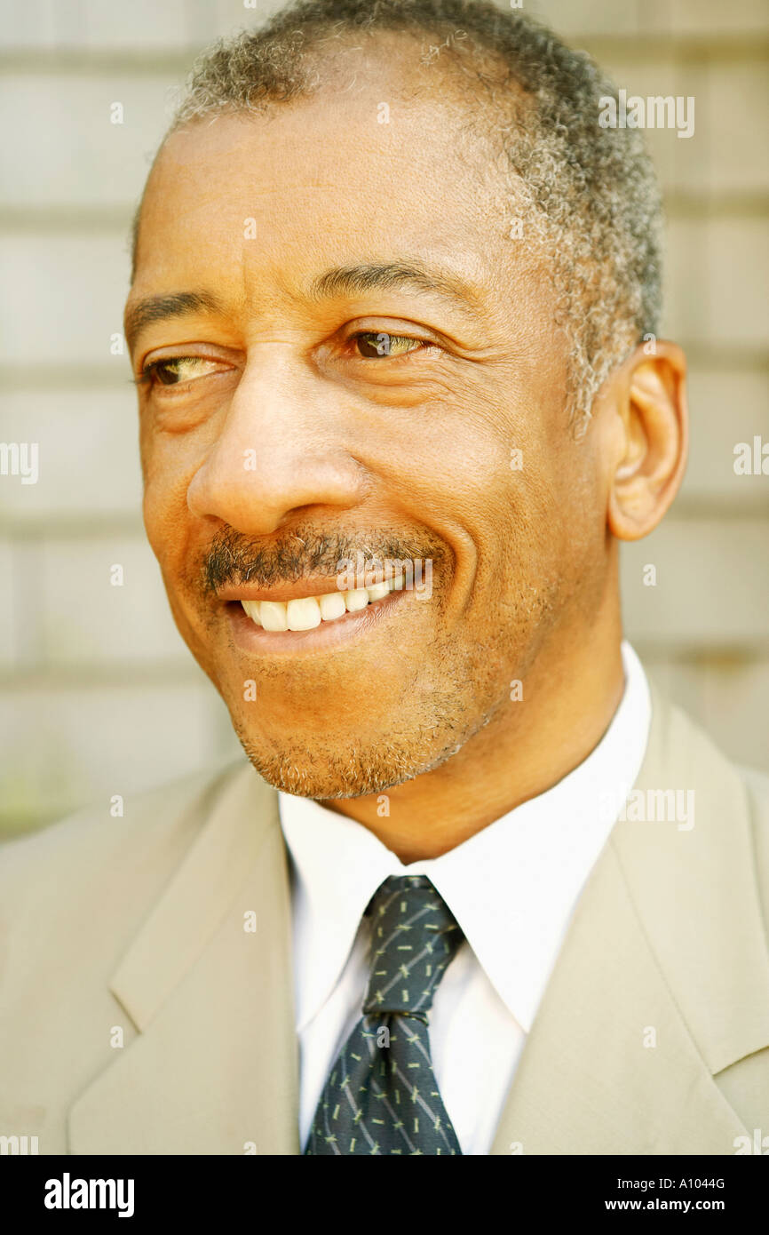 Middle-aged African man wearing a suit Stock Photo - Alamy