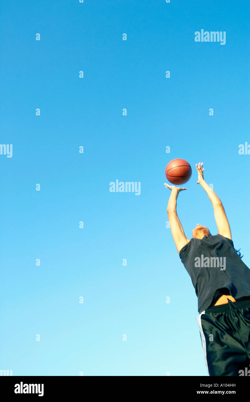 African girl jumping ball hi-res stock photography and images - Alamy