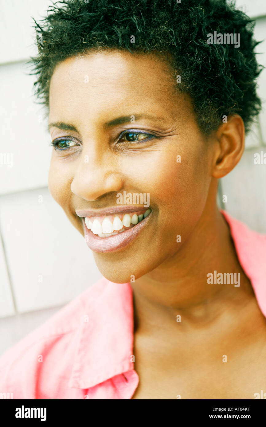 Young African woman smiling Stock Photo - Alamy