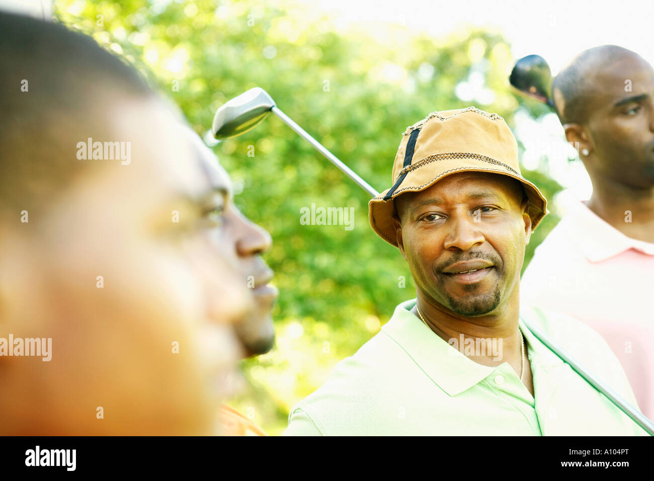 African men playing golf Stock Photo - Alamy