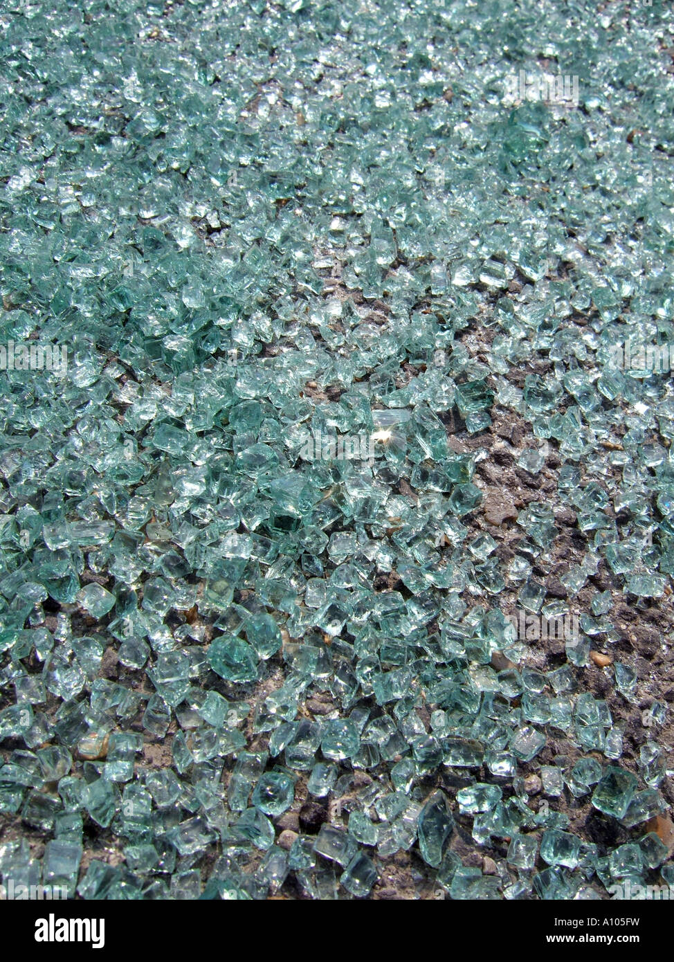 glass from smashed car window on road surface Stock Photo - Alamy