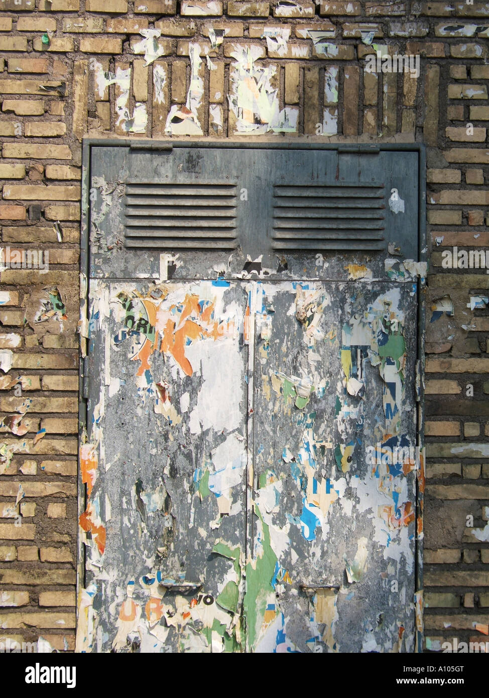 fly posting on building in town Stock Photo - Alamy