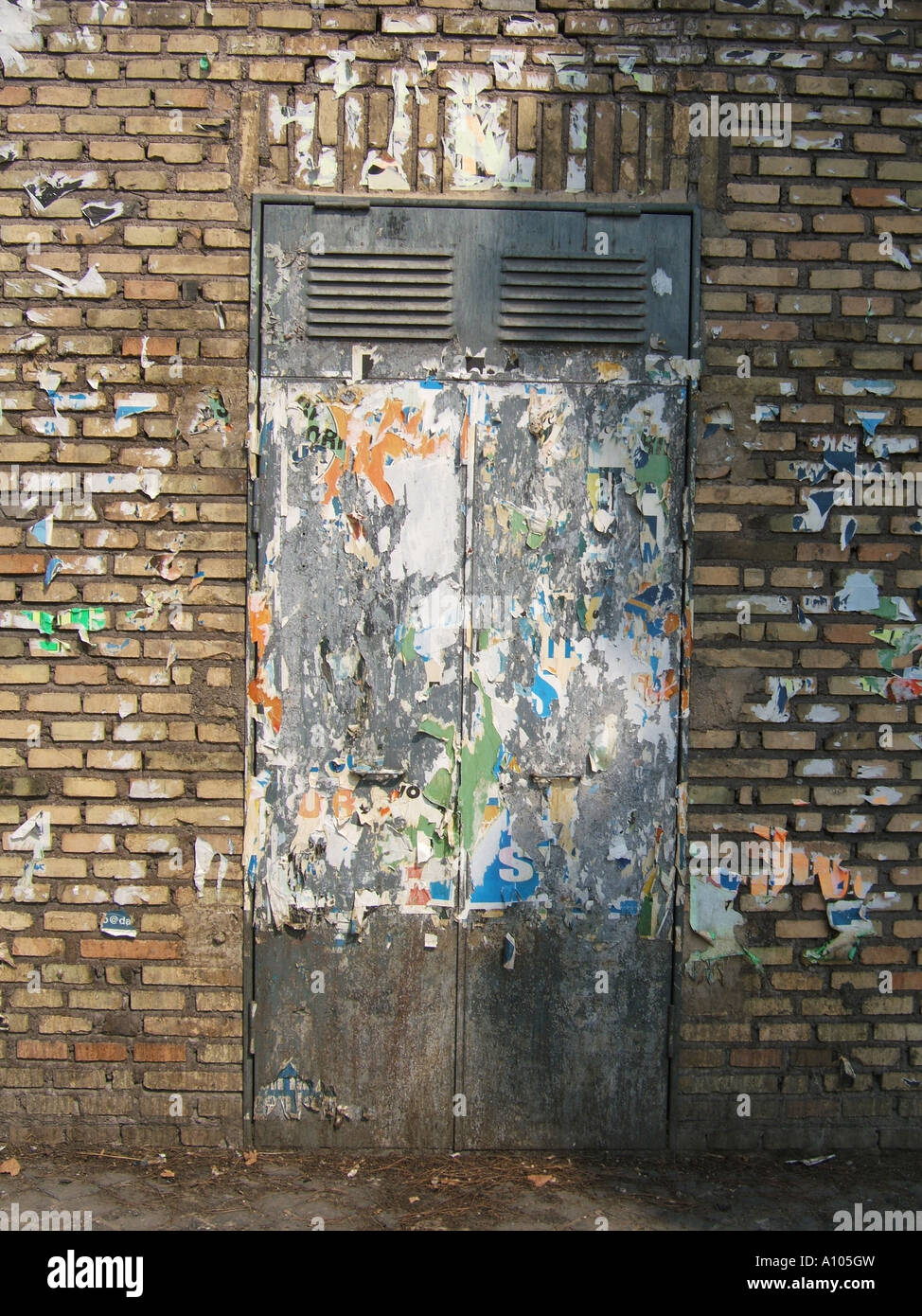 fly posting on building in town Stock Photo - Alamy