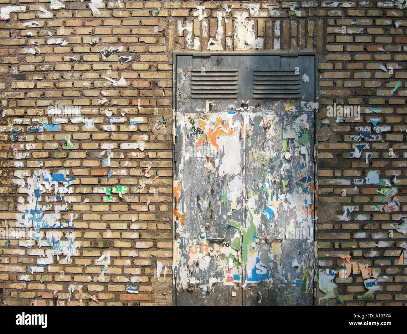 fly posting on building in town Stock Photo - Alamy