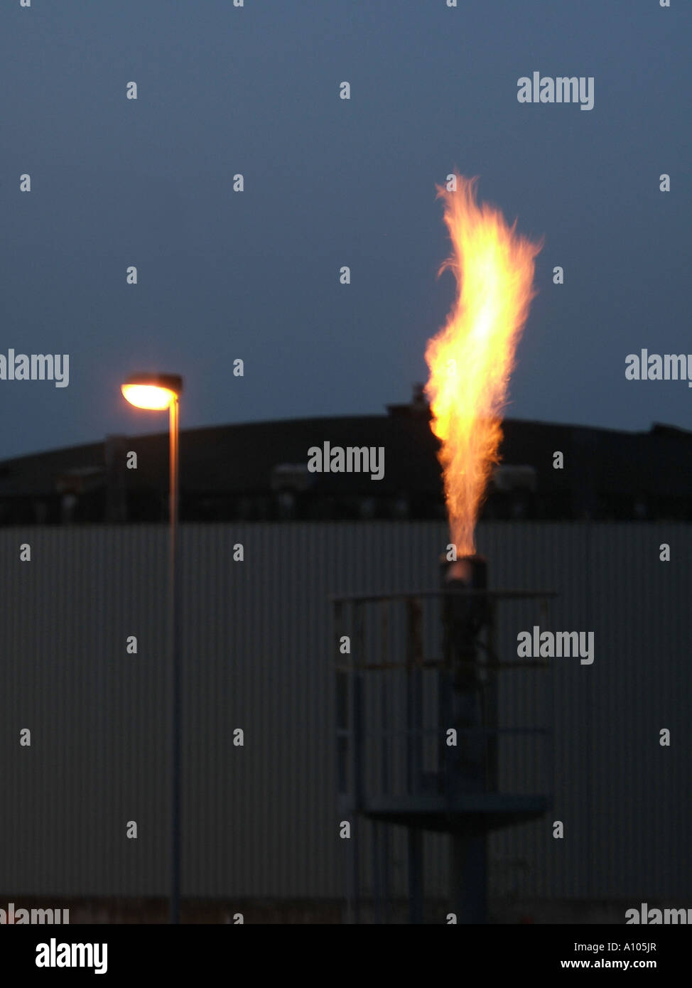 flame at factory at night Stock Photo - Alamy
