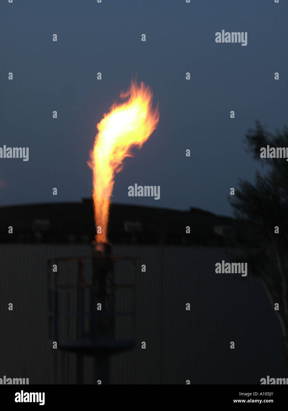 flame at factory at night Stock Photo - Alamy