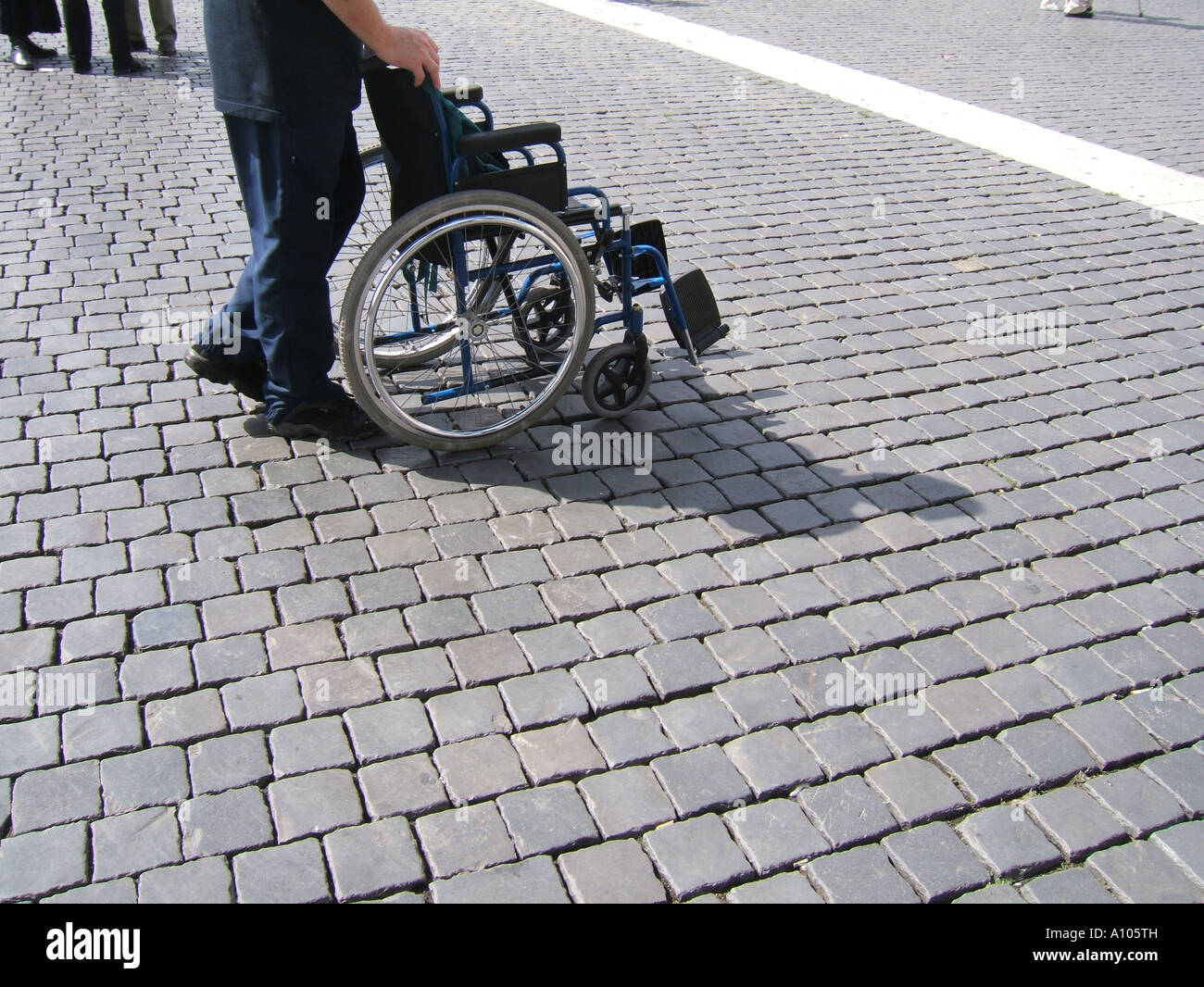 person pushing wheel chair Stock Photo - Alamy