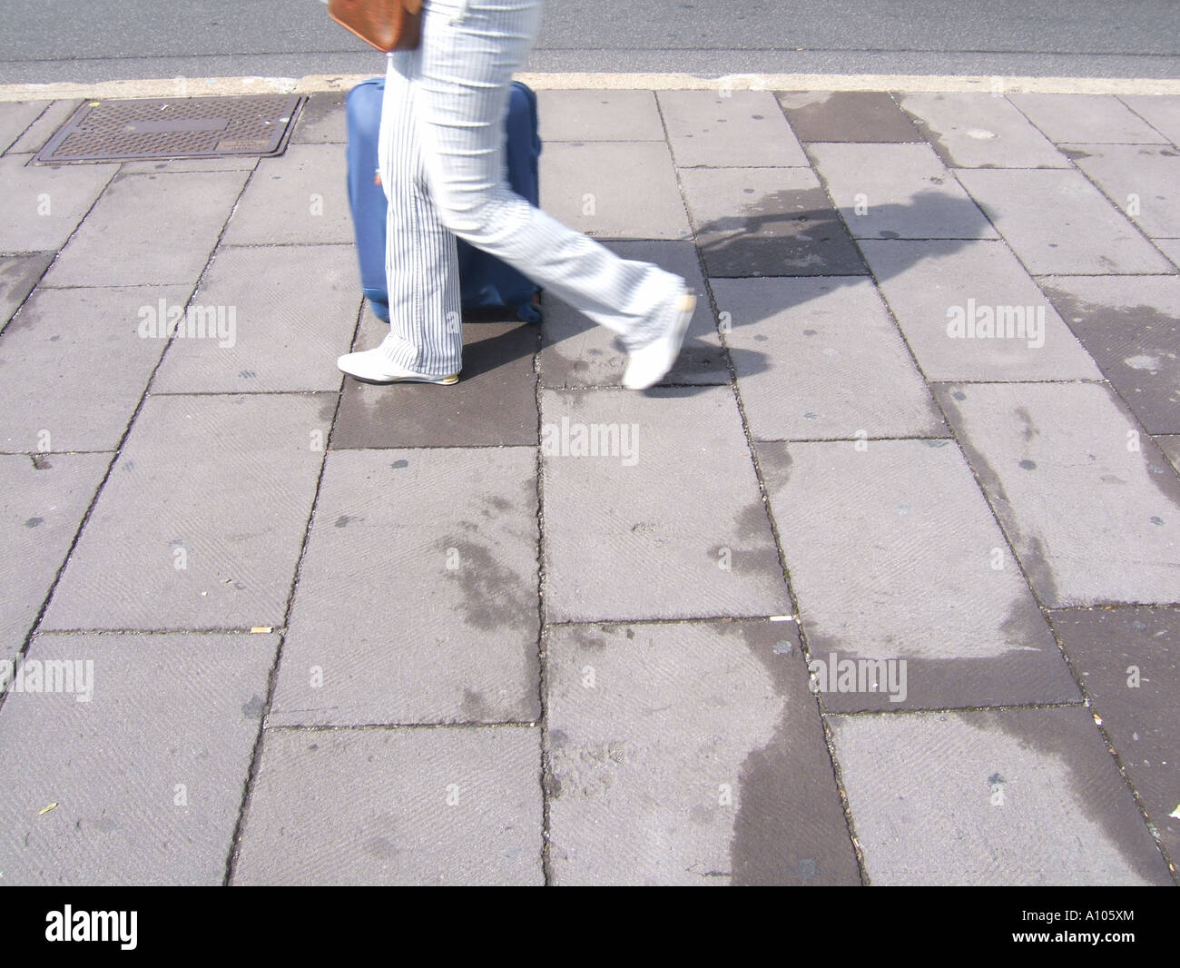 young shoppers walking on sidewalk in town Stock Photo - Alamy