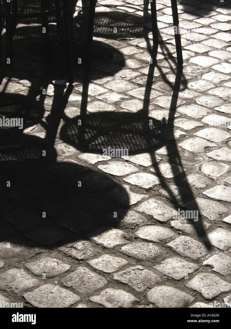 empty black chairs and tables outdoors Stock Photo - Alamy