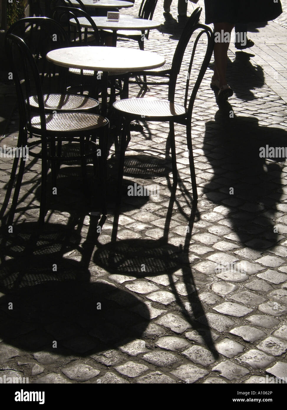 empty black chairs and tables outdoors Stock Photo - Alamy