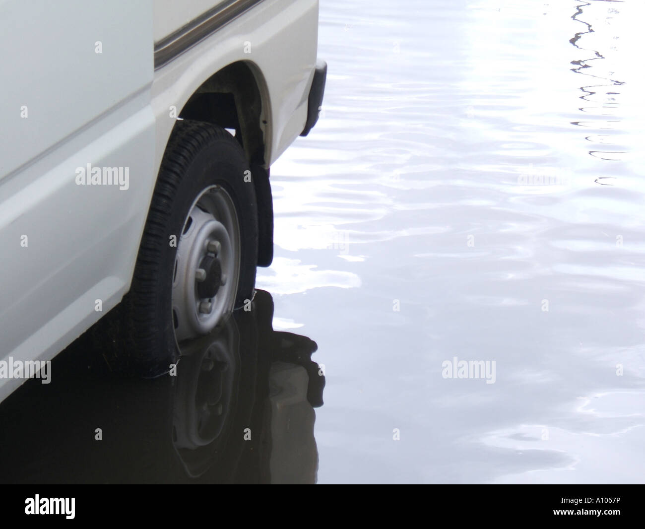 van on flooded road Stock Photo - Alamy