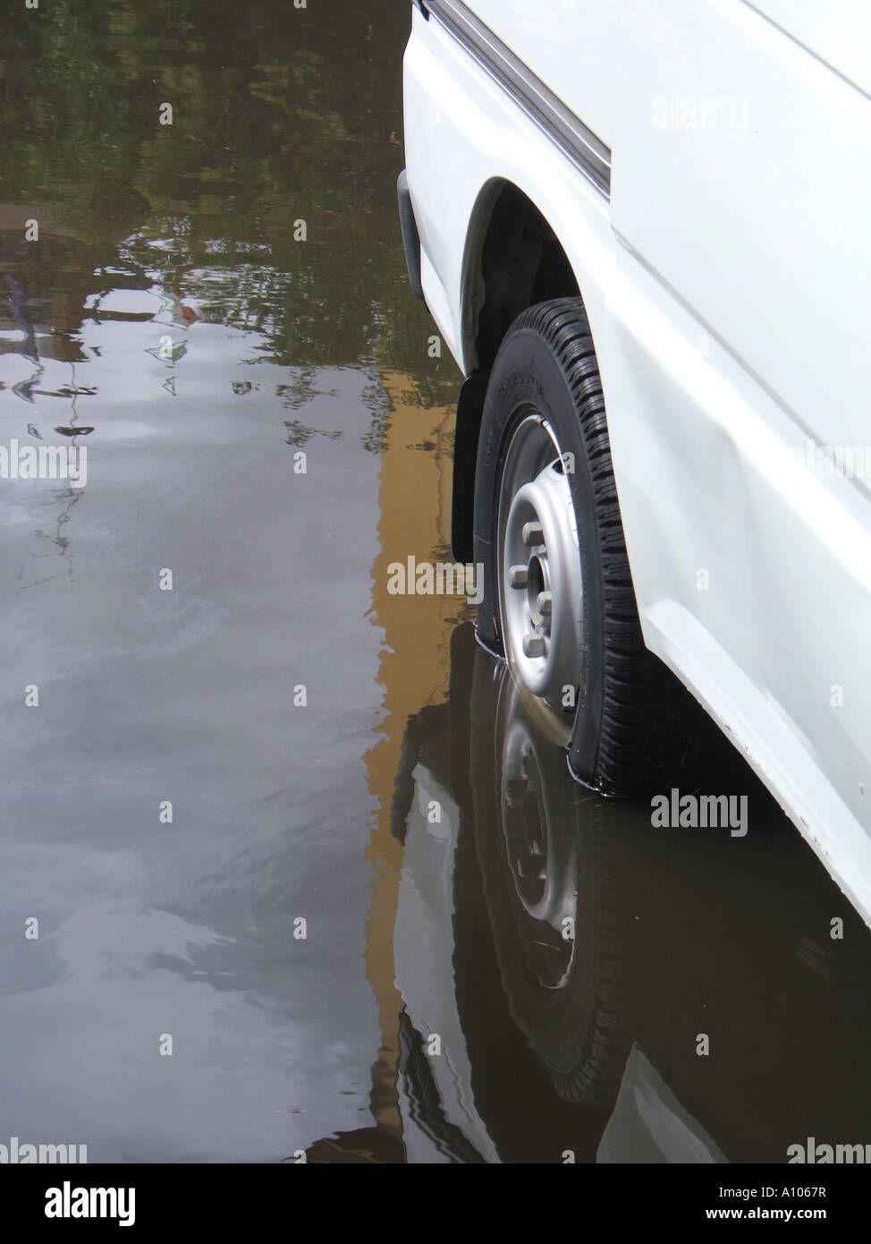 van on flooded road Stock Photo - Alamy