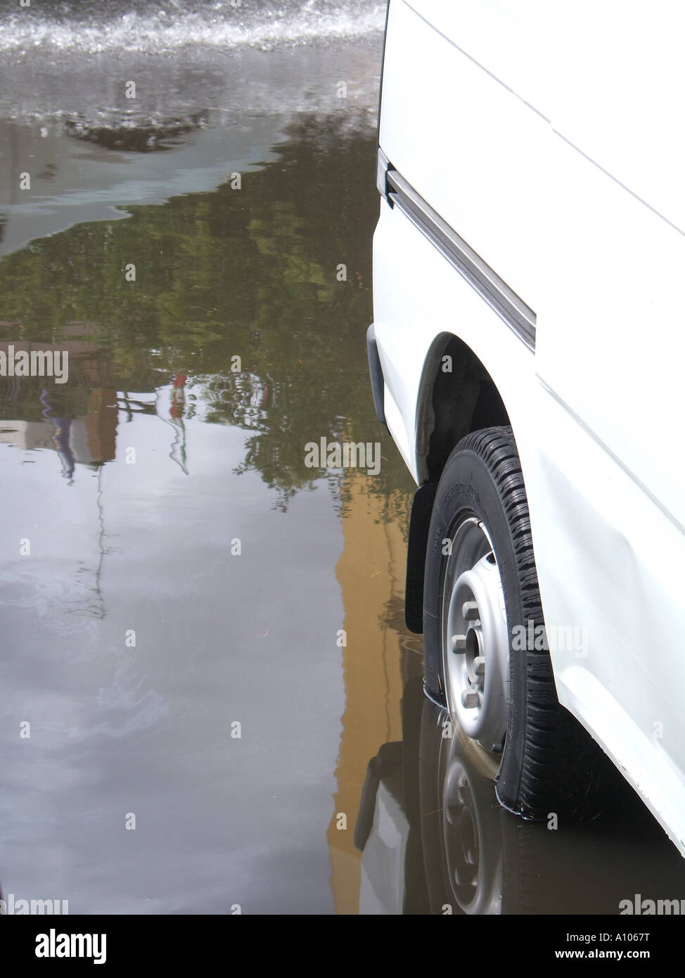 van on flooded road Stock Photo - Alamy
