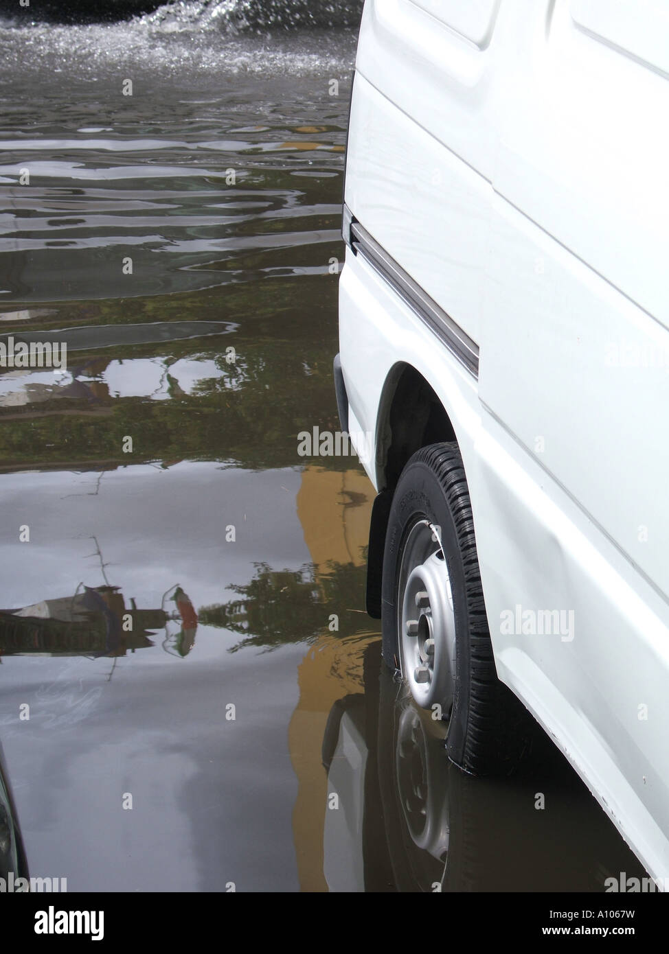 van on flooded road Stock Photo - Alamy