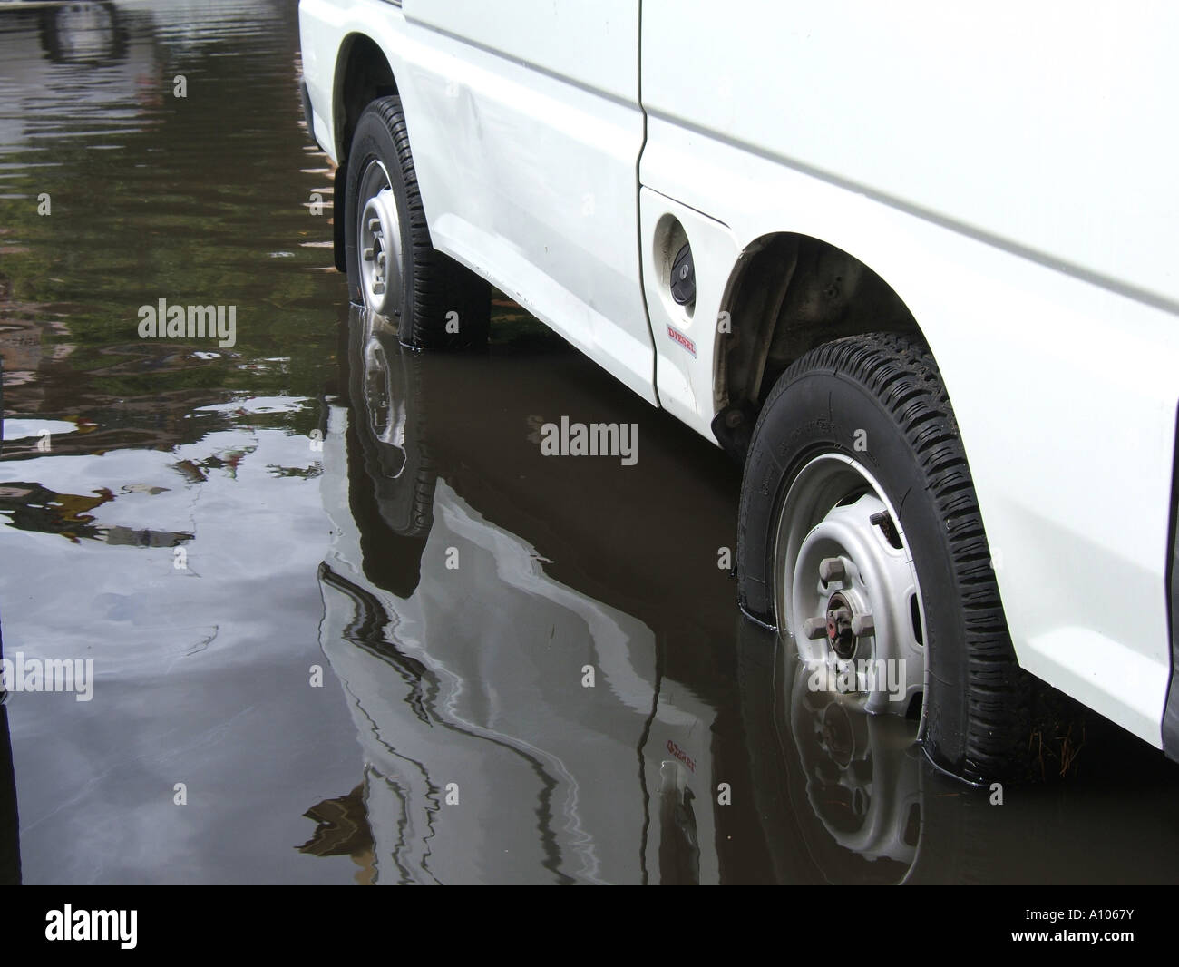 van on flooded road Stock Photo - Alamy