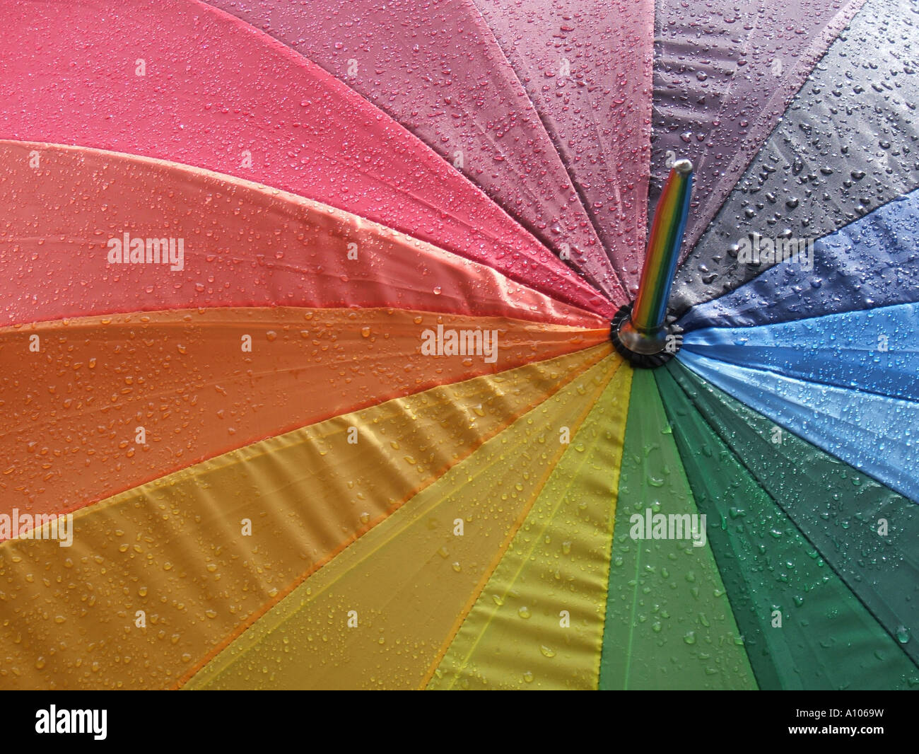 rainbow coloured umbrella Stock Photo - Alamy