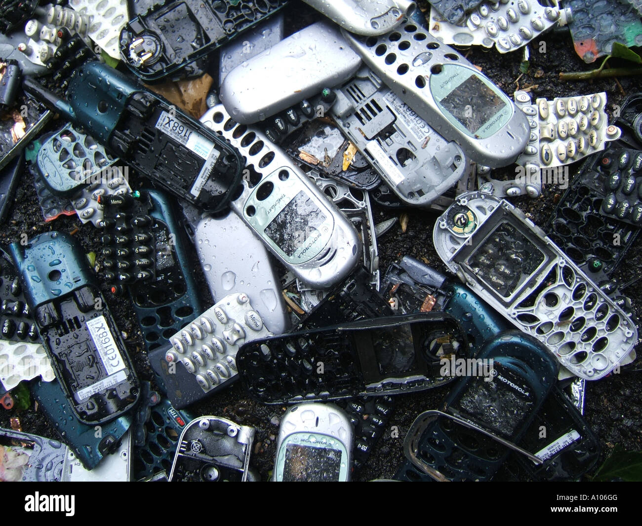 pile of old mobile phone covers dumped on road Stock Photo - Alamy